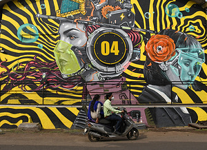 SOPA Images - Gallery - Graffiti raising awareness on wearing face ...