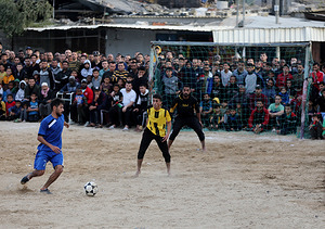 SOPA Images - Gallery - Palestinian youths playing soccer at the ...