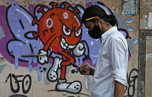 SOPA Images - Gallery - Covid-19 awareness graffiti in Mumbai, India