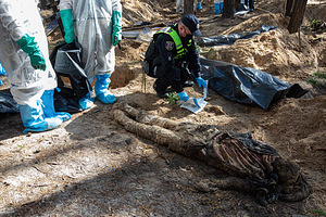 SOPA Images - Gallery - Exhumation of graves at a place of mass burial ...